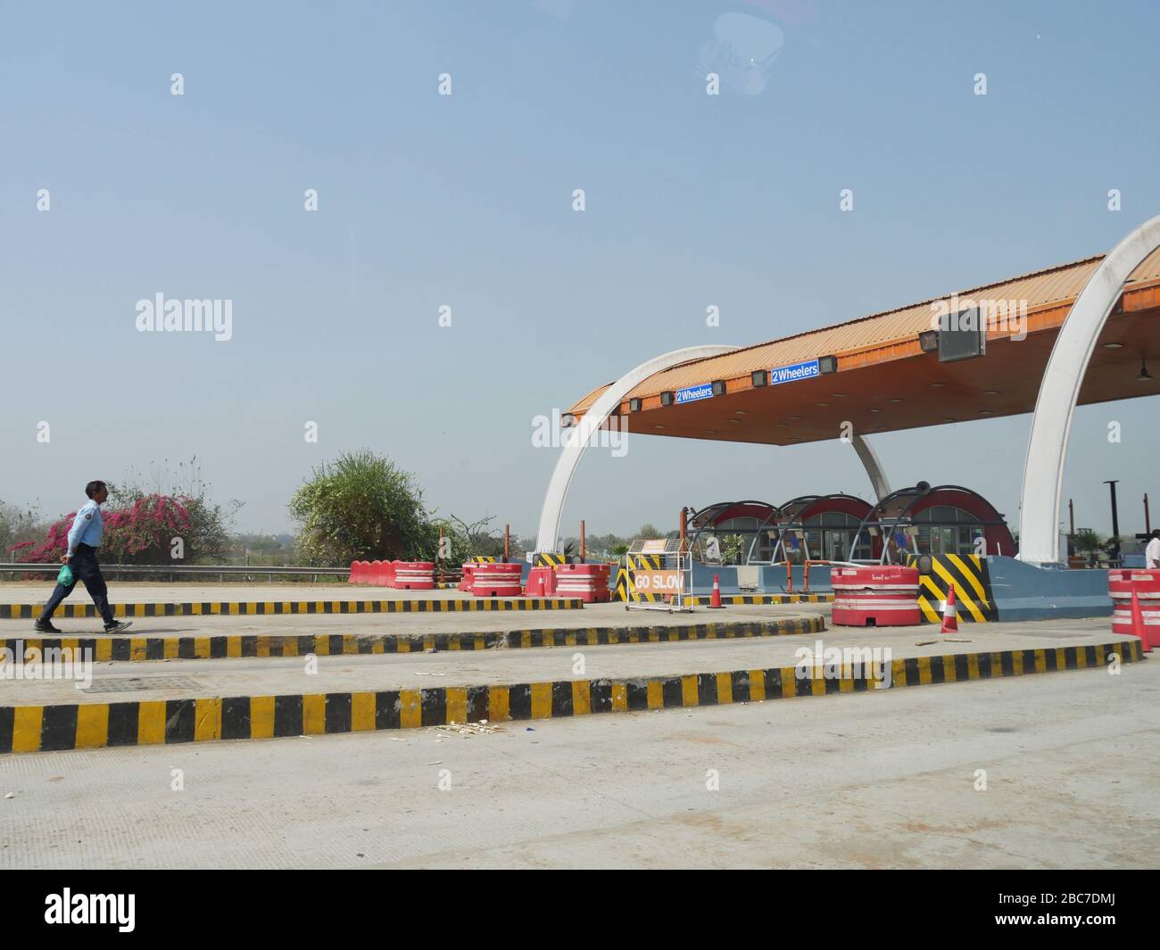 Yamuna Expressway, India- March 2018: Side view of the toll gate at the ...