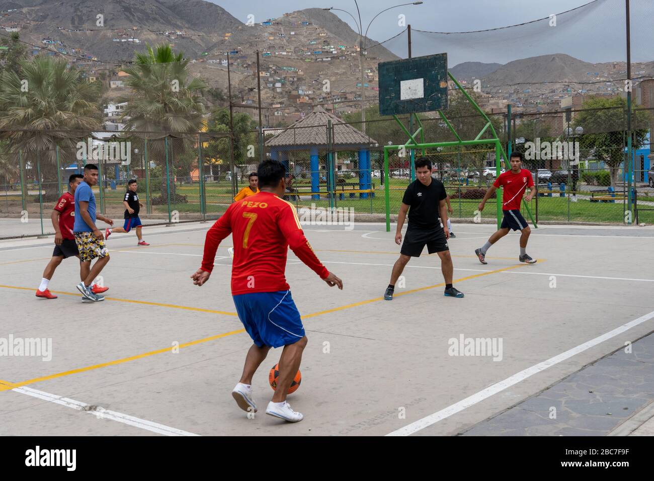 Peruvian friends from Iquitos play a Sunday afternoon game of soccer in ...