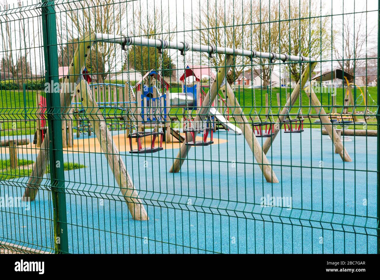 Empty swings at the children`s playground in Maynooth Ireland closed ...