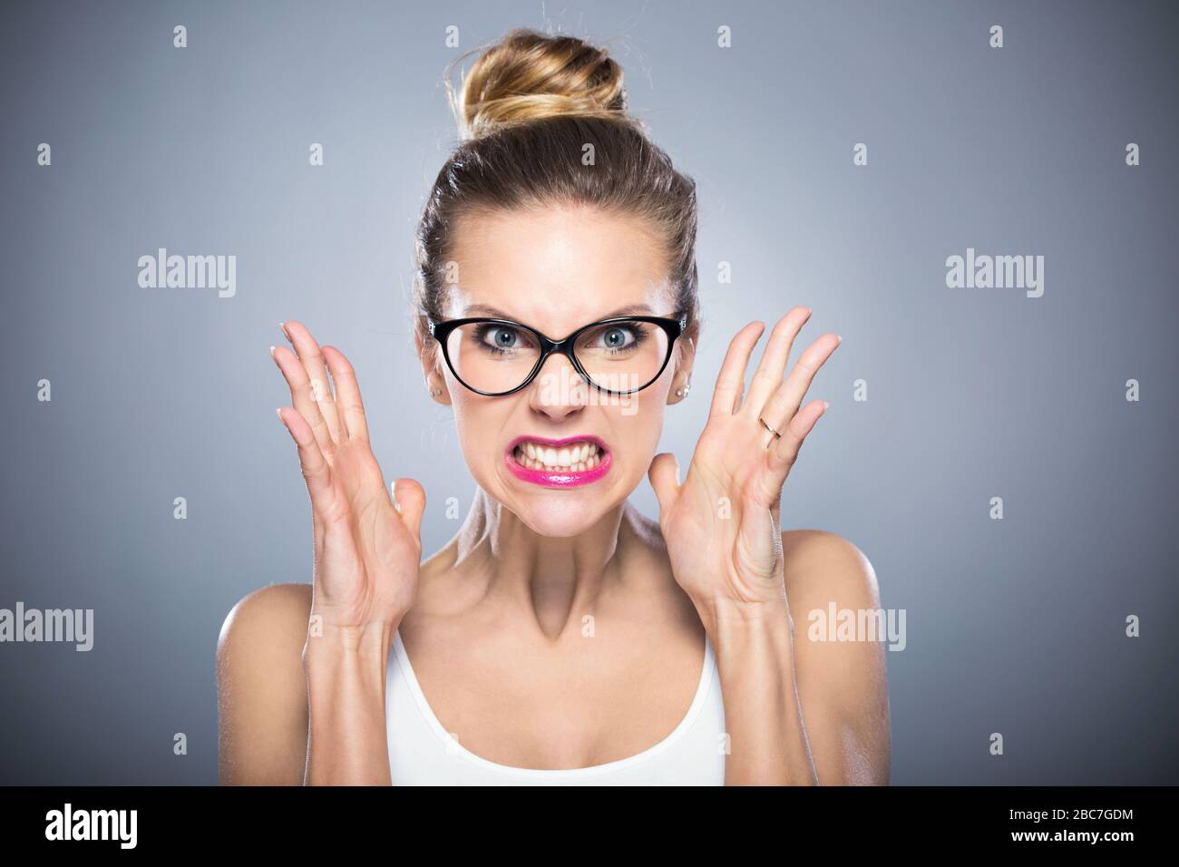 Angry young woman Stock Photo - Alamy
