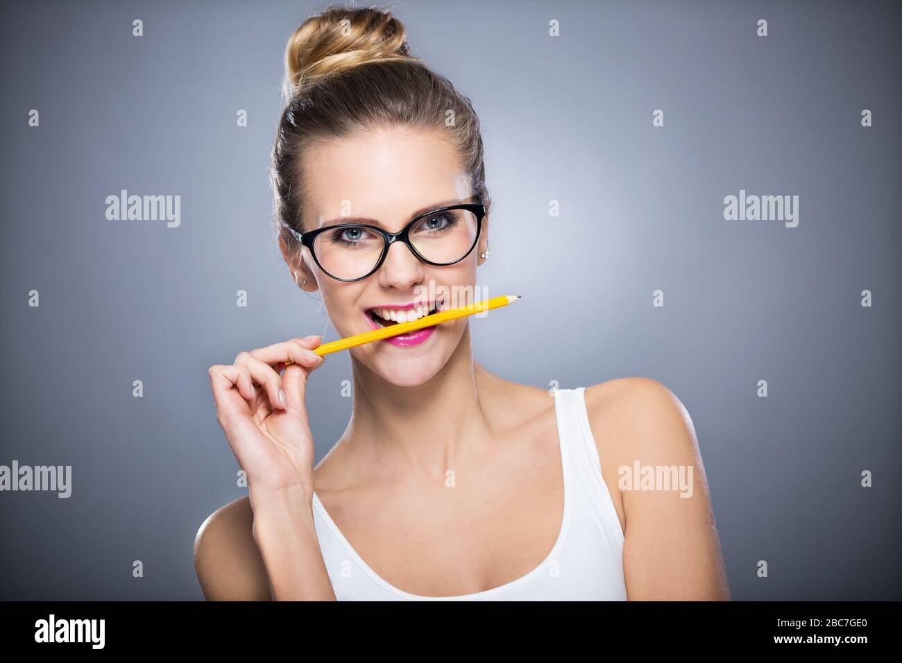 Biting glasses hi-res stock photography and images - Alamy
