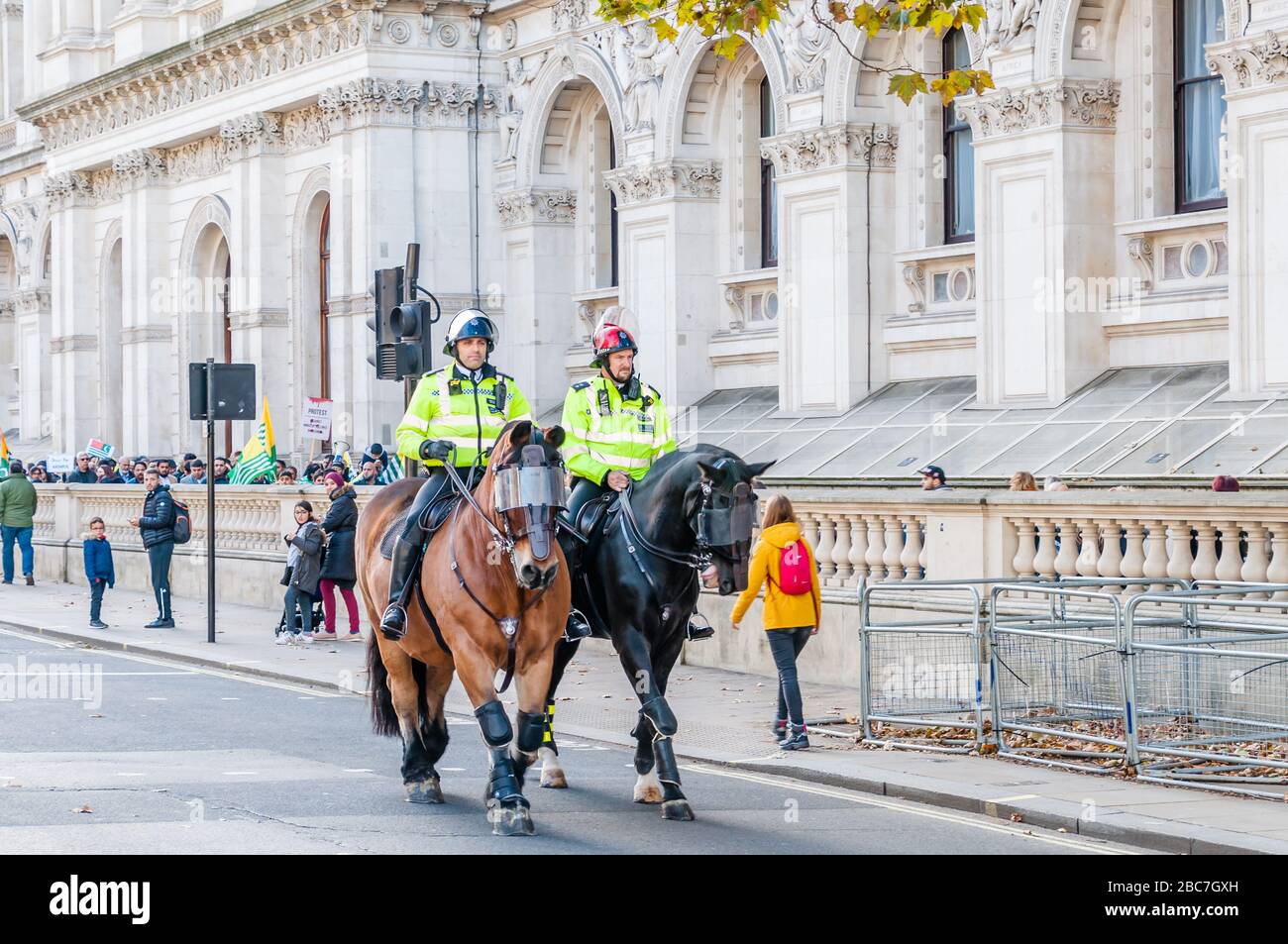 London Metropolitan Police Officers On Motorcyclists And Horses The