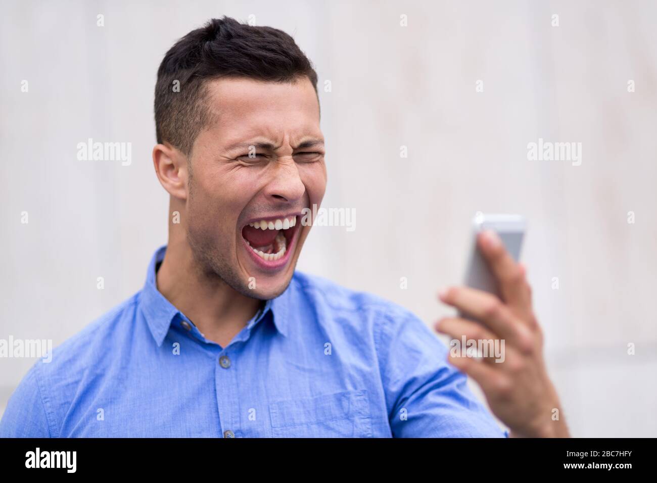 Frustrated young guy shouting hi-res stock photography and images - Alamy