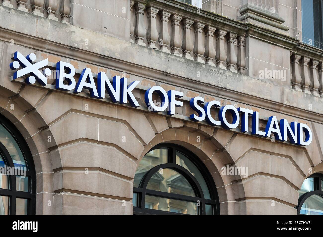 Bank of Scotland name logo outside a bank, High Street, Ayr, UK Stock ...
