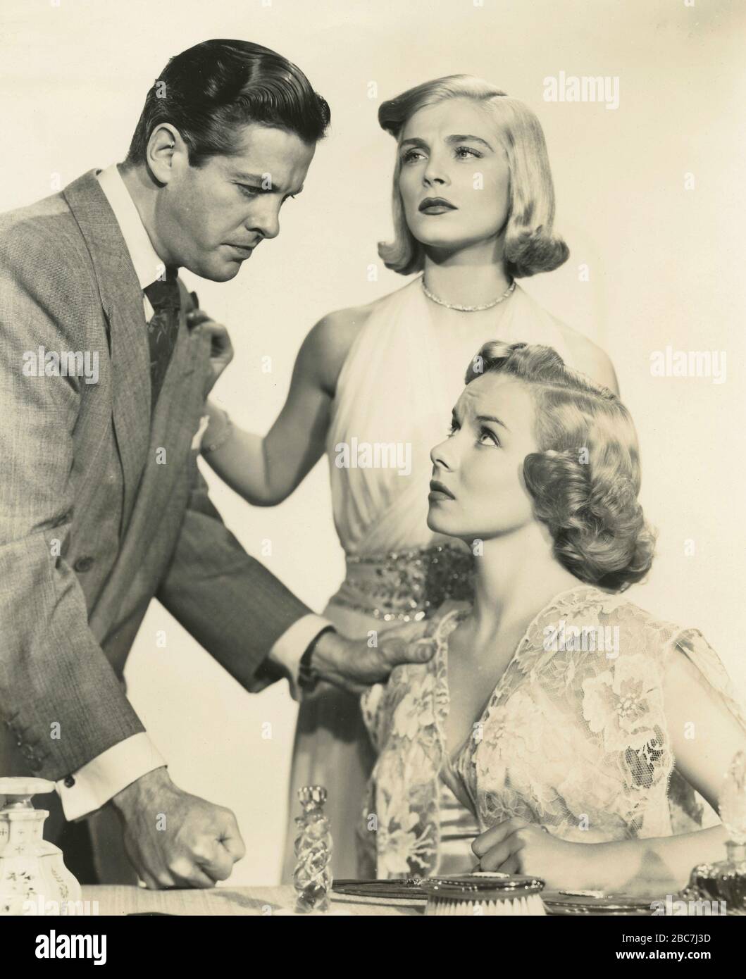 American actors Robert Cummings, Lizabeth Scott, and Diana Lynn in the movie Paid in Full, USA ...