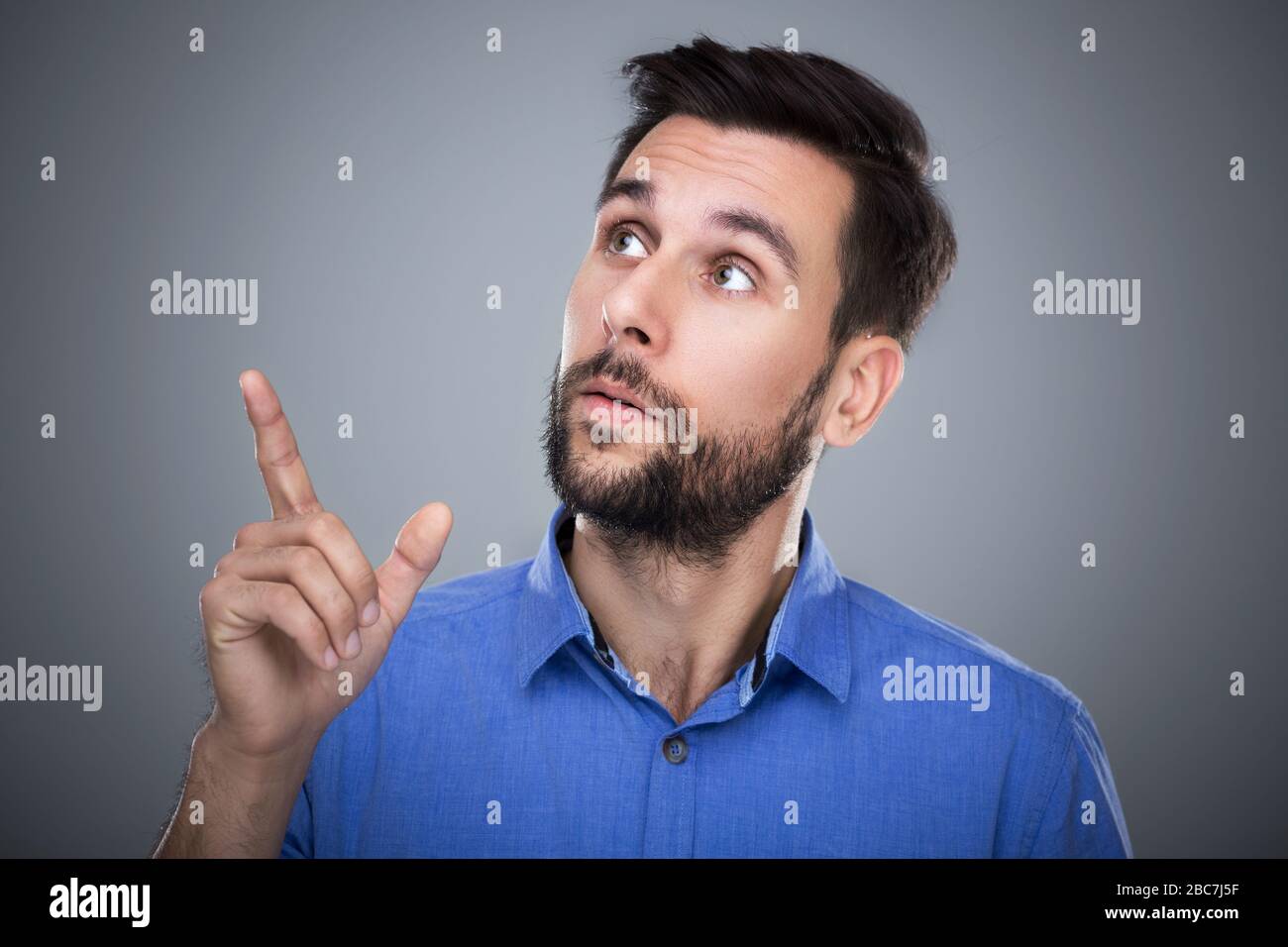 Man looking up Stock Photo - Alamy