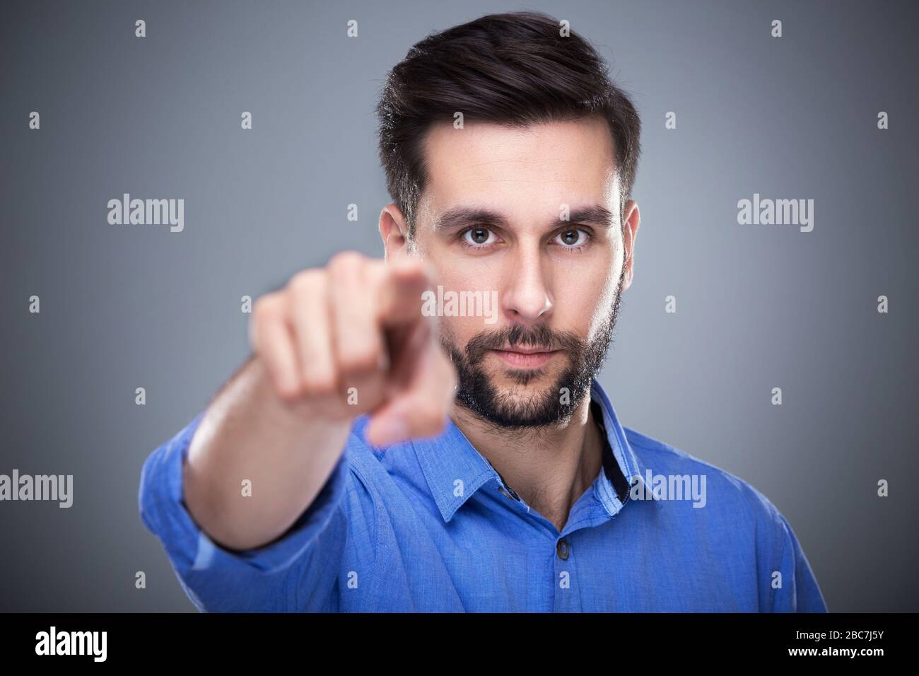 Man pointing finger Stock Photo - Alamy