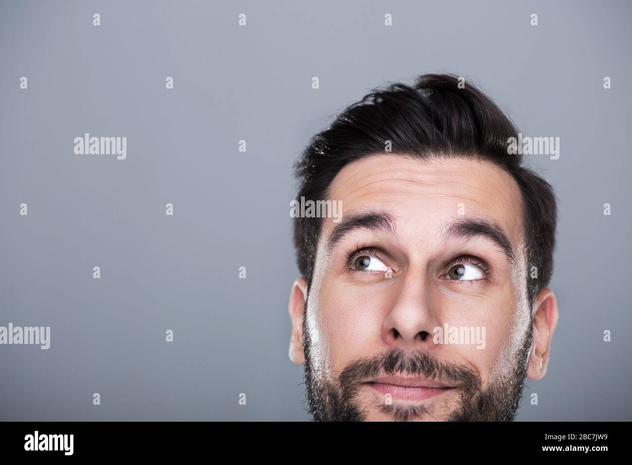 Man looking up Stock Photo - Alamy