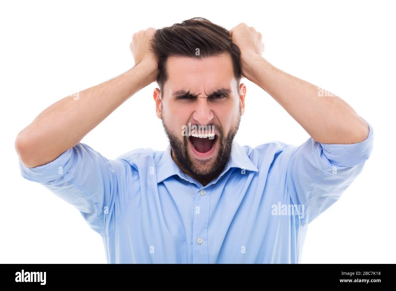 Furious young man Stock Photo - Alamy