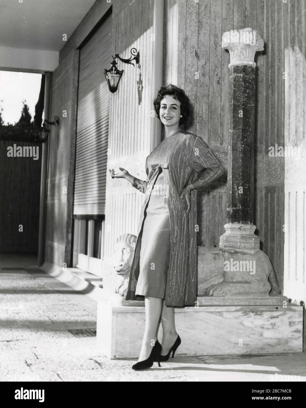 Model from the 1960s presenting an outfit with open dress, Italy Stock ...