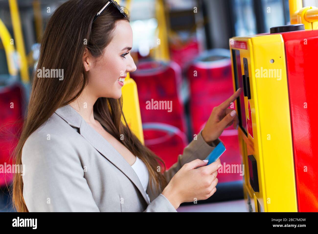 Woman standing bus stop hi-res stock photography and images - Alamy