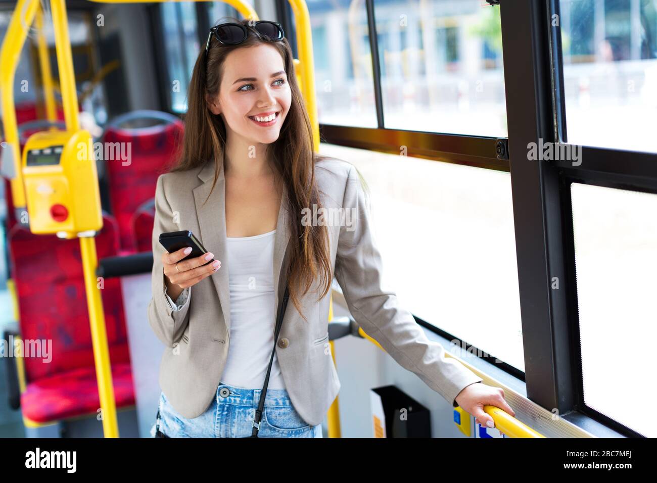 Woman at bus shelter hi-res stock photography and images - Alamy