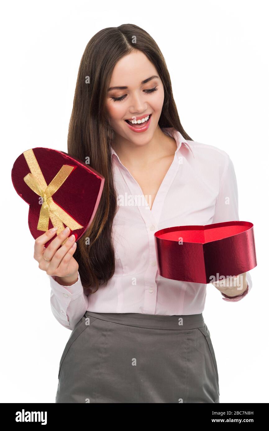 Woman holding heart-shaped box Stock Photo - Alamy