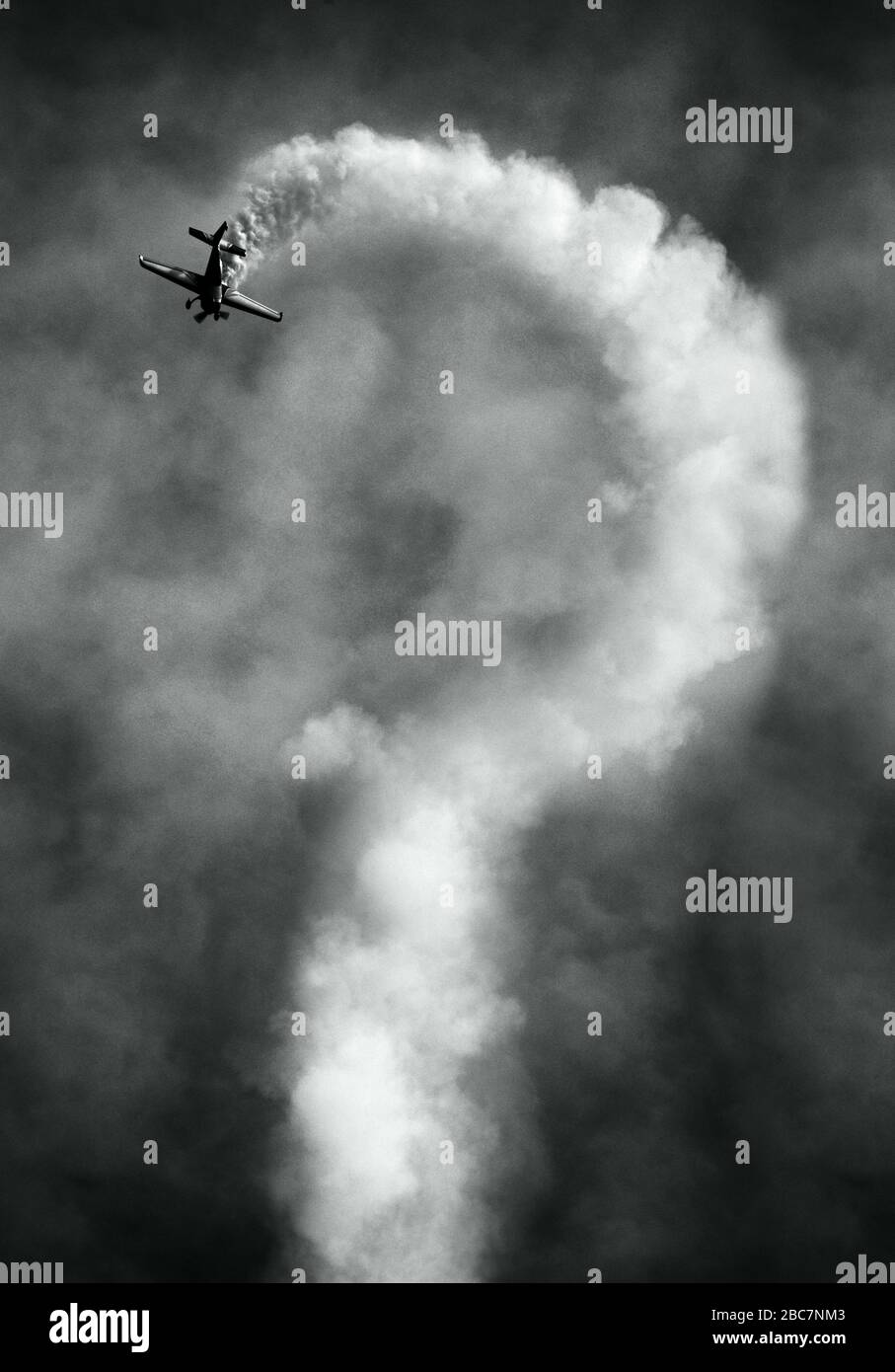 The pilot of an Extra 330LT aerobatic airplane is writing a question ...