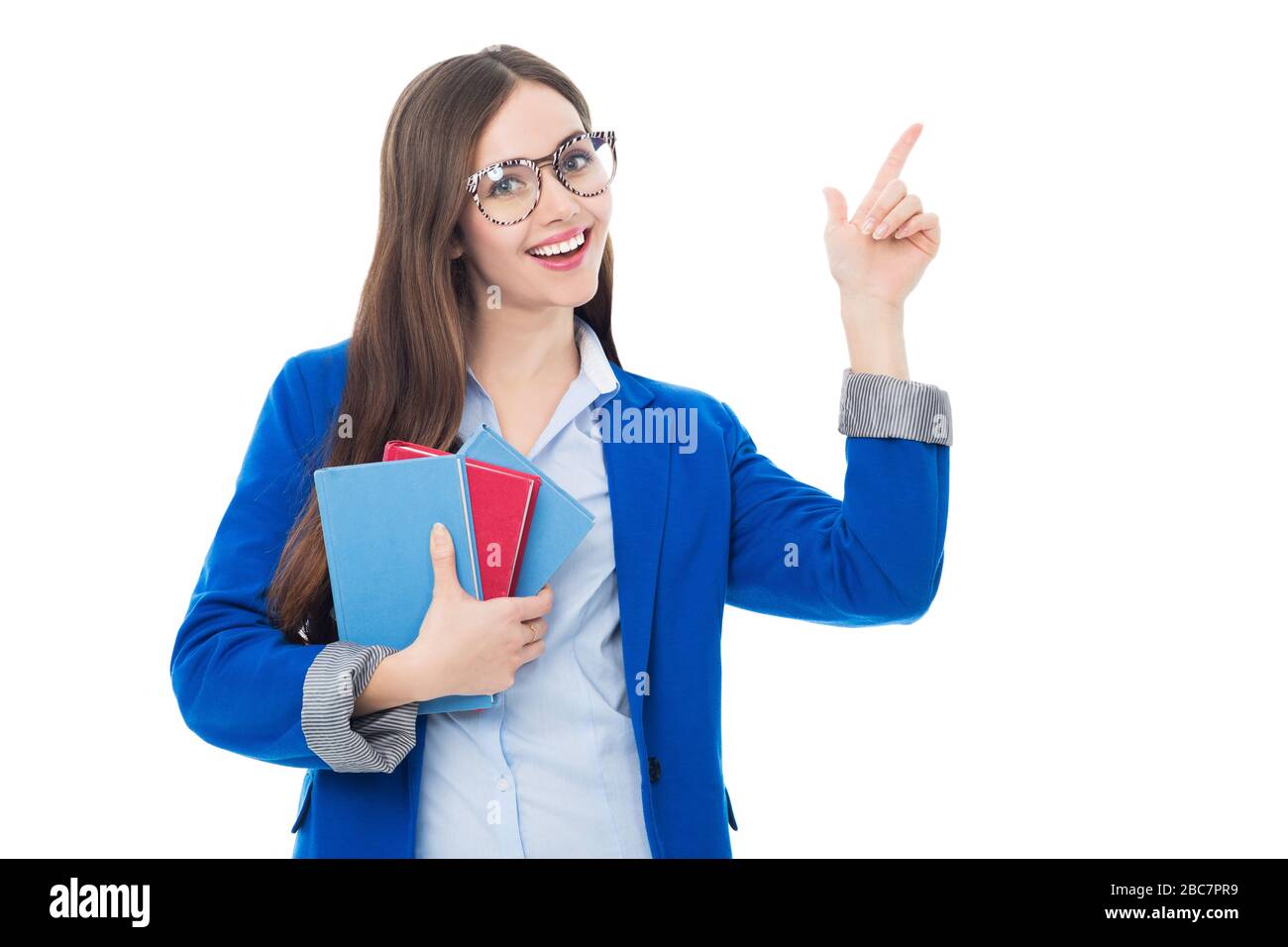 Beautiful woman pointing finger Stock Photo - Alamy