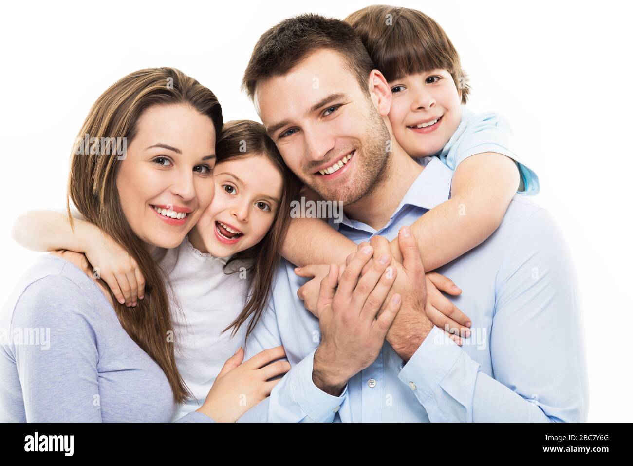 Young family with two kids Stock Photo - Alamy