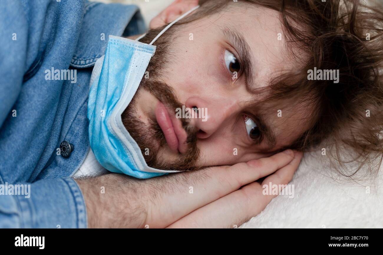 Lone guy at home in quarantine. Staying at home makes you sad and crazy ...