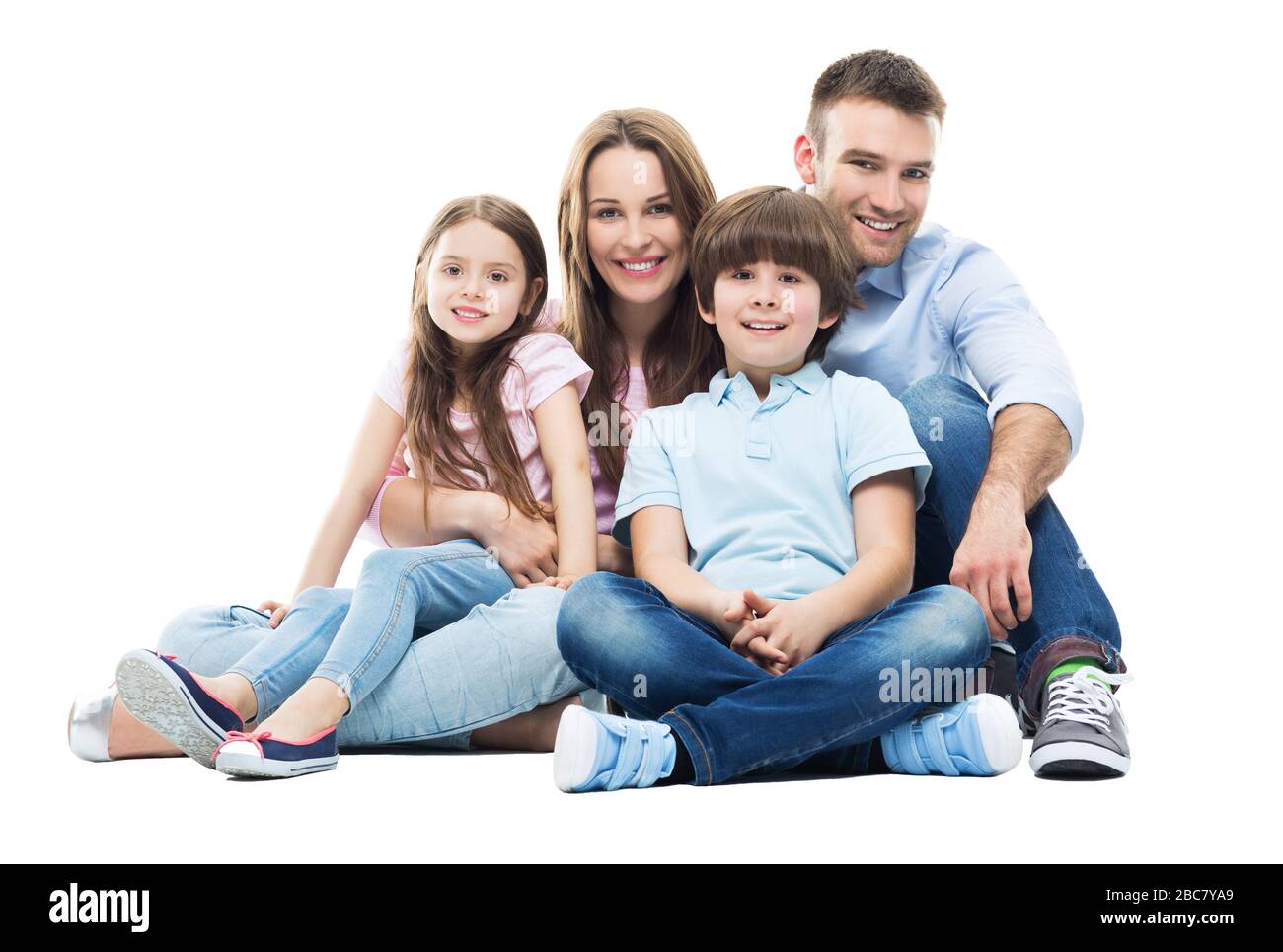 Young family with two kids Stock Photo - Alamy