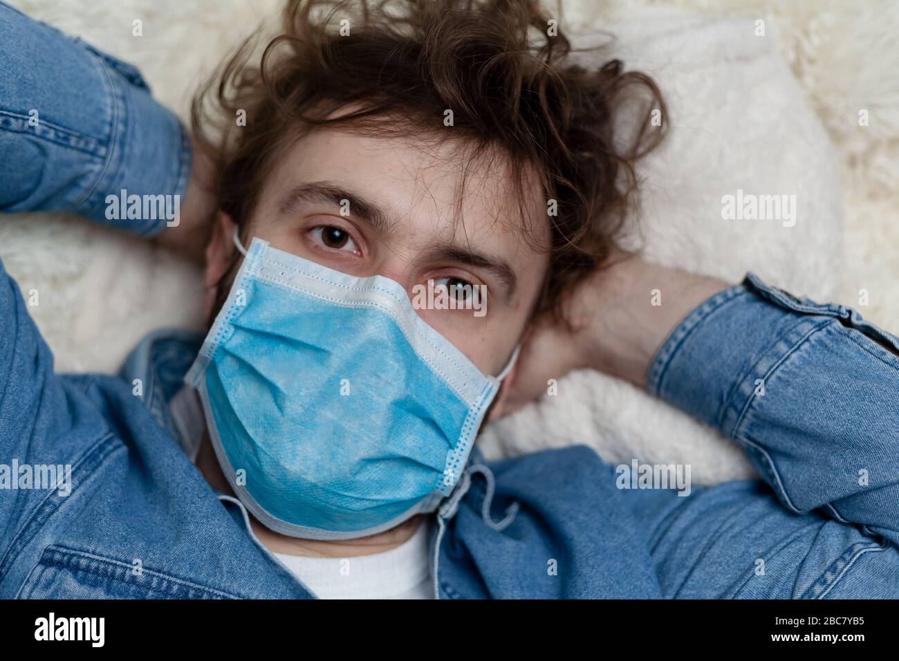 Lone guy at home in quarantine. Staying at home makes you sad and crazy ...