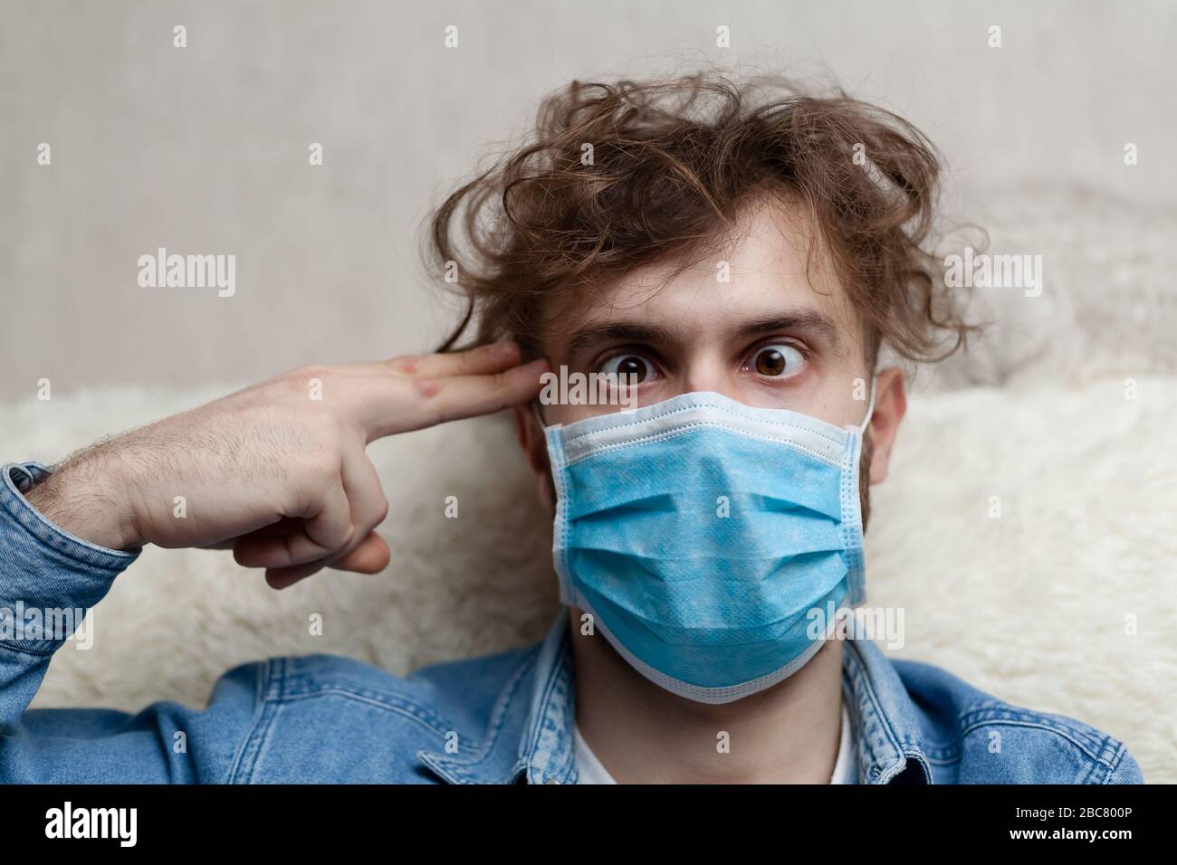 Lone guy at home in quarantine. Staying at home makes you sad and crazy ...