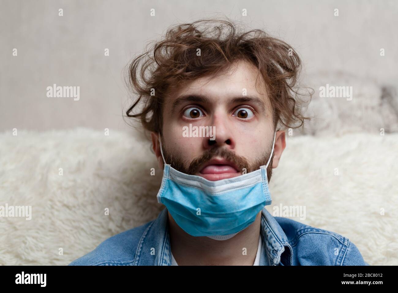 Lone guy at home in quarantine. Staying at home makes you sad and crazy ...
