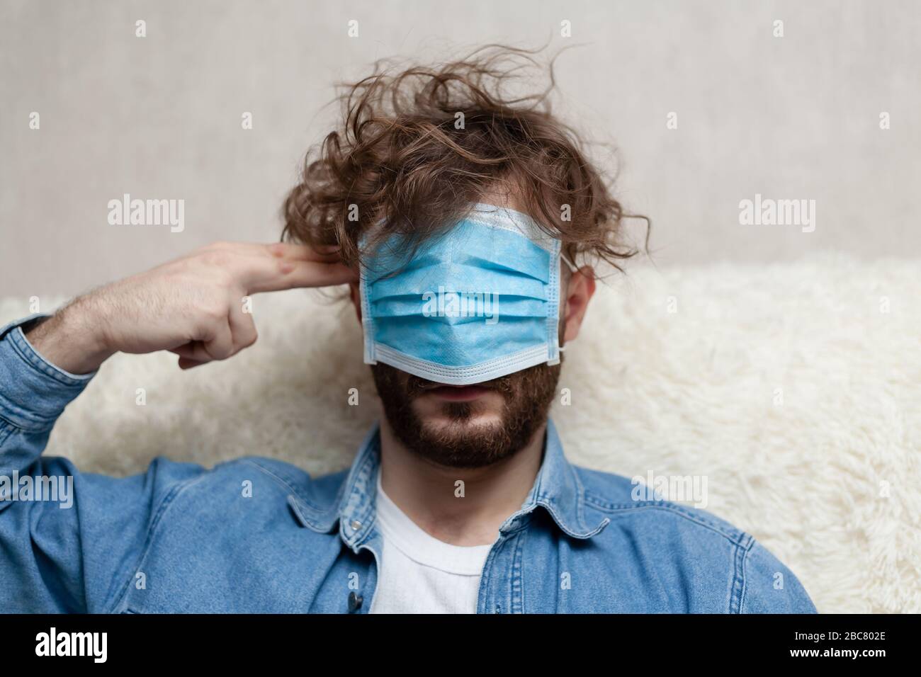 Lone guy at home in quarantine. Staying at home makes you sad and crazy ...