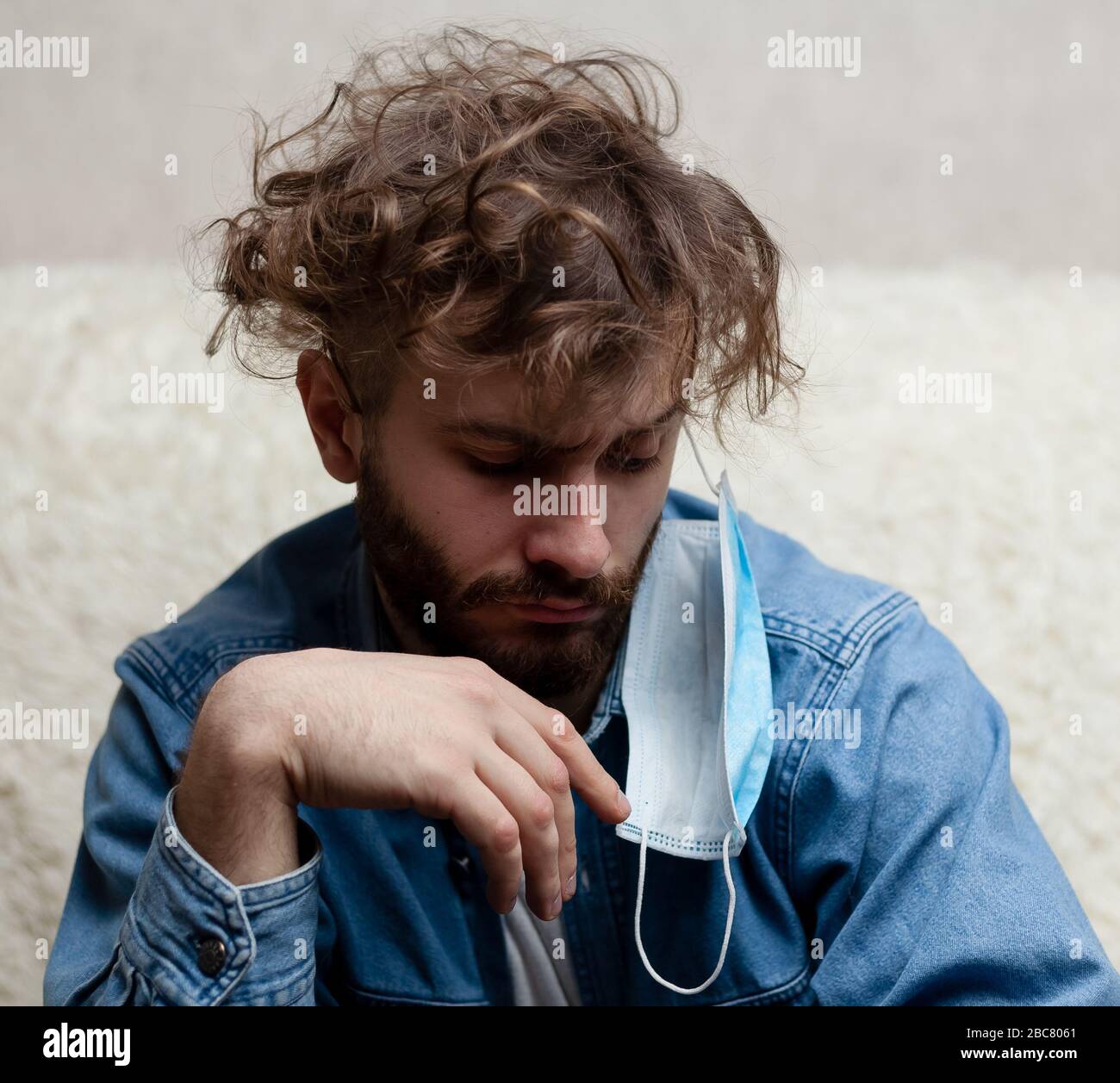 Lone guy at home in quarantine. Staying at home makes you sad and crazy ...