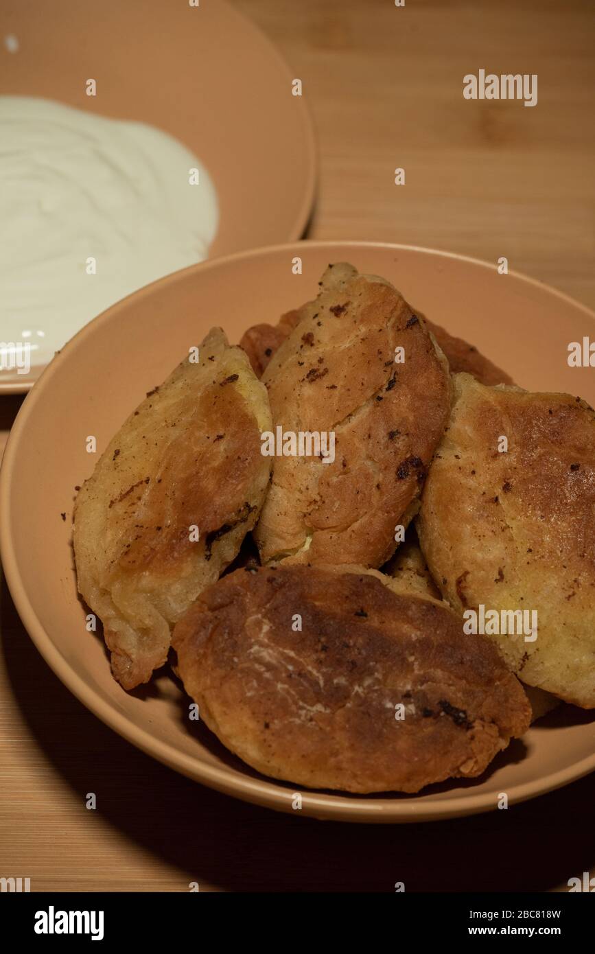 Frying pies, pasty on a pan. Patties in the pan. Homemade. Fried ...