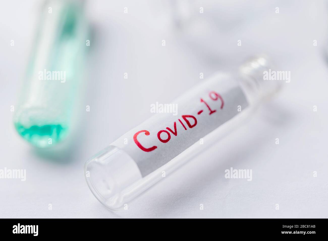 Corona Virus Lab test background. Glass vile or test tube for ...