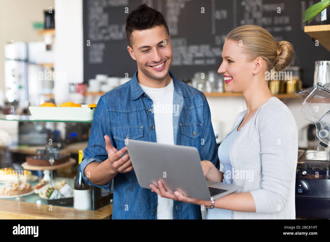 Shop counter staff hi-res stock photography and images - Alamy