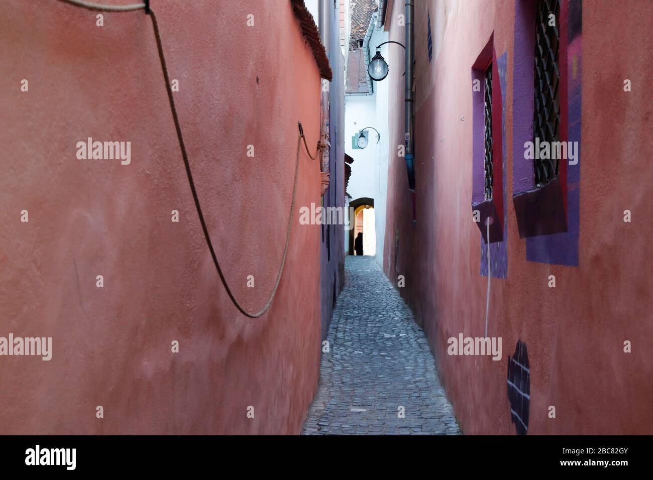 Strada Sforii in Brasov, Romania, one of the narrowest streets in ...