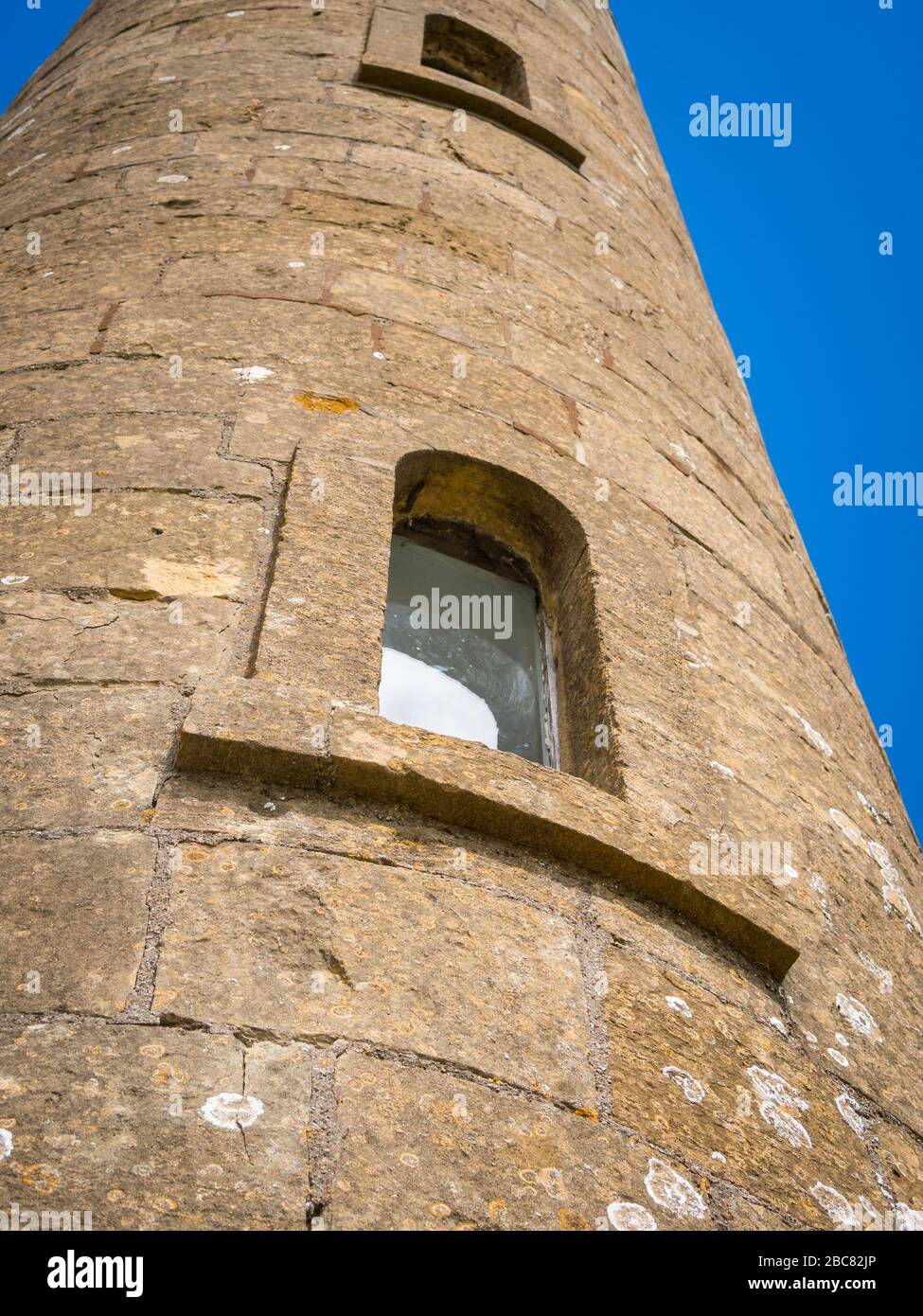 View of Broadway tower and grounds on a bright blue sky day Stock Photo ...