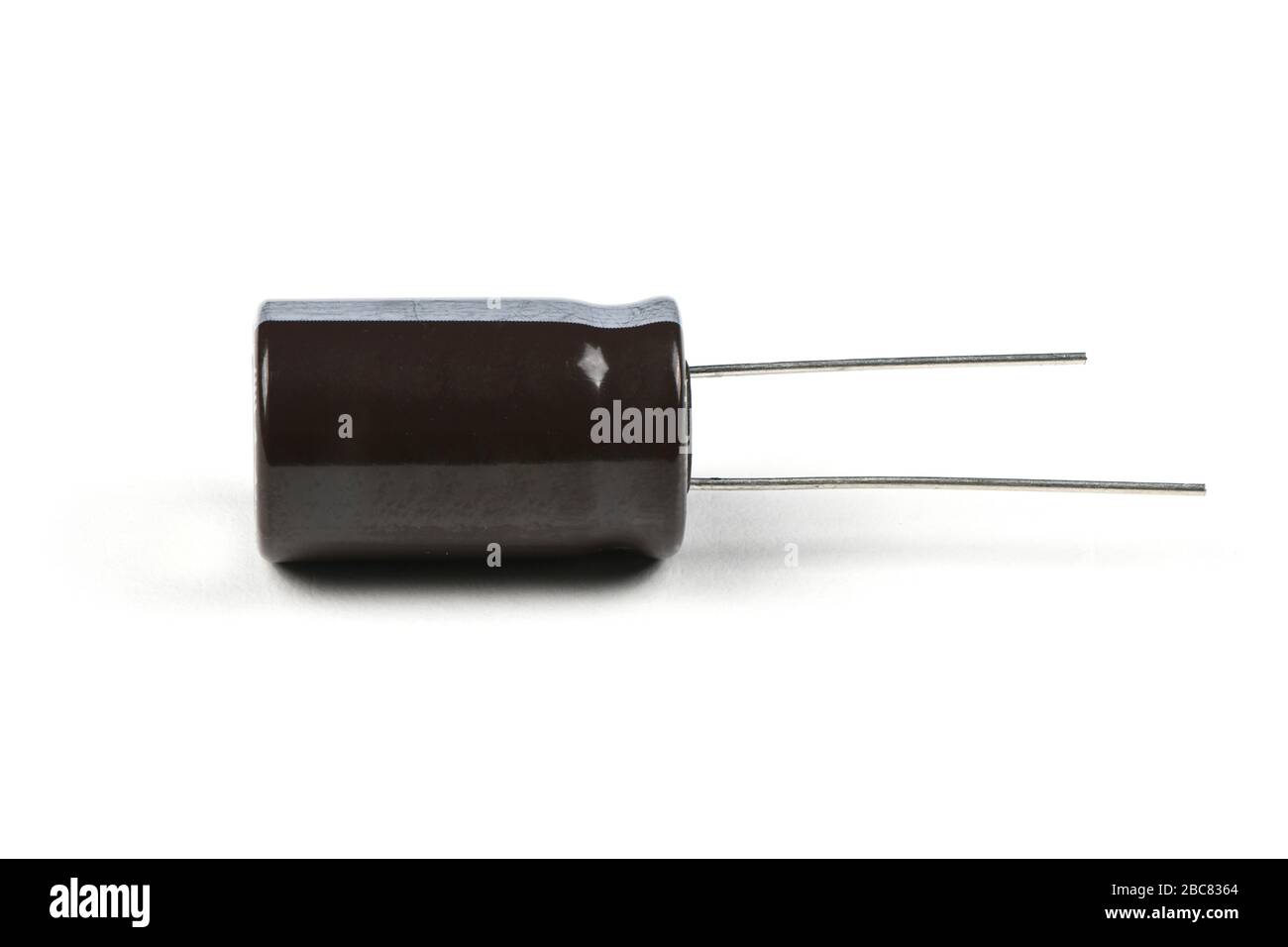 Electrolytic capacitor isolated on white background. High resolution photo. Full depth of field ...