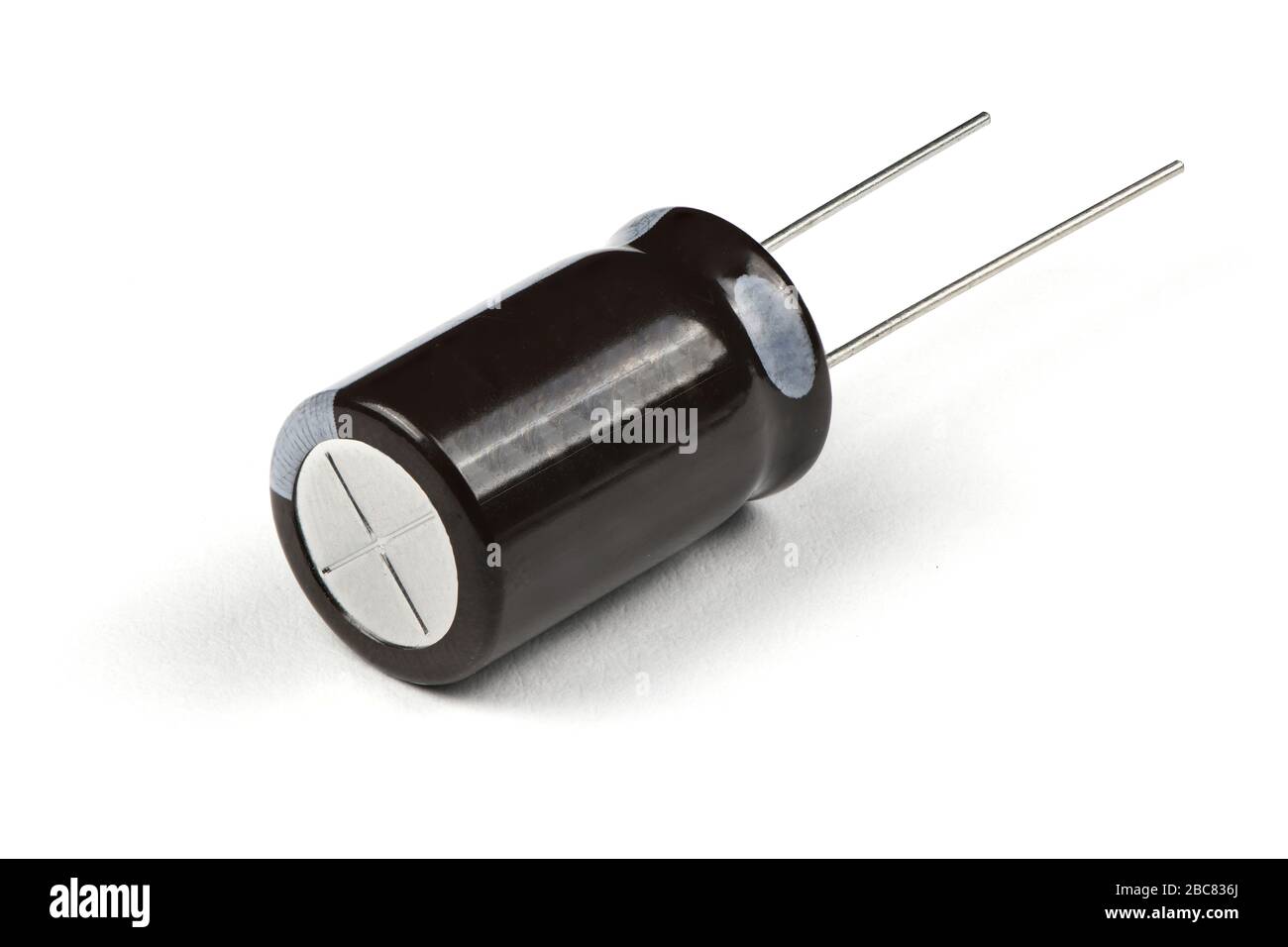 Electrolytic capacitor isolated on white background. High resolution photo. Full depth of field ...