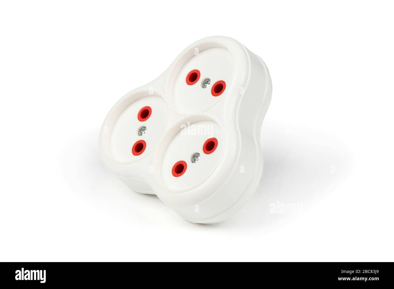 Plastic electrical tee connector with three sockets on a white ...