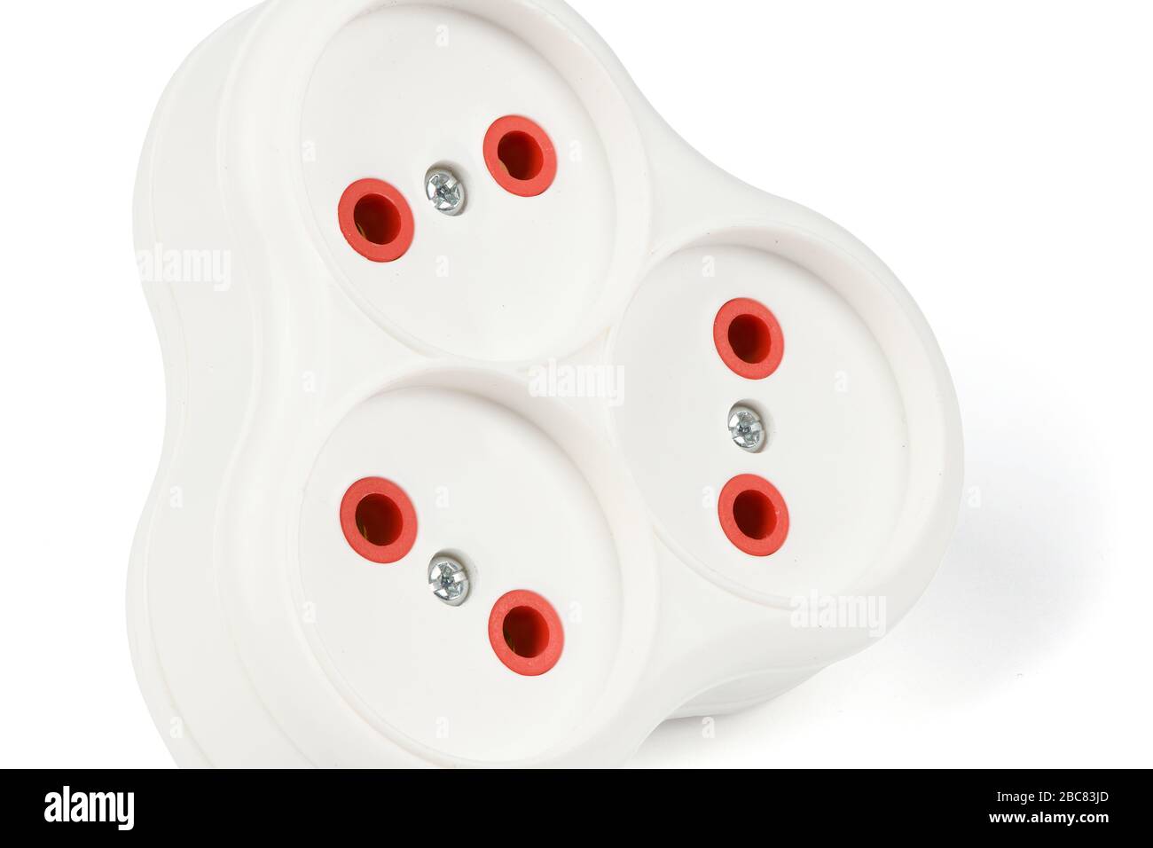 Plastic electrical tee connector with three sockets on a white ...