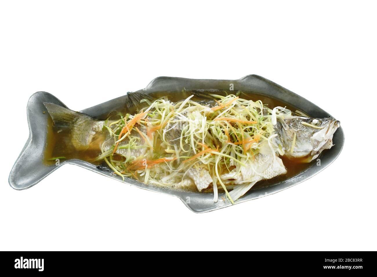 steamed bass fish dressing soybean sauce topping slice ginger and ...