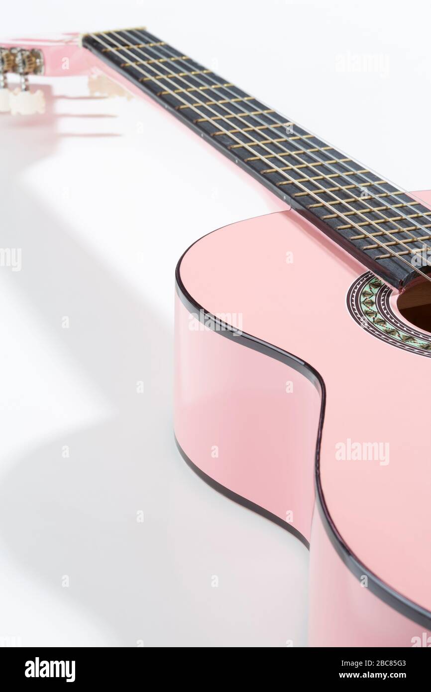 Pink Acoustic Guitar Musical Instrument Stock Photo - Alamy