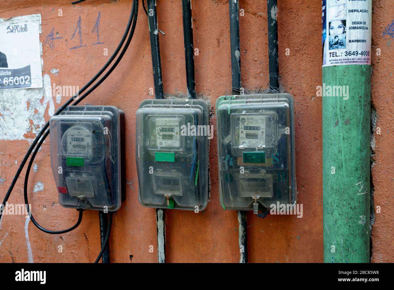 Row of power supplies outsid ea building in the Rochinha favela, Rio De ...