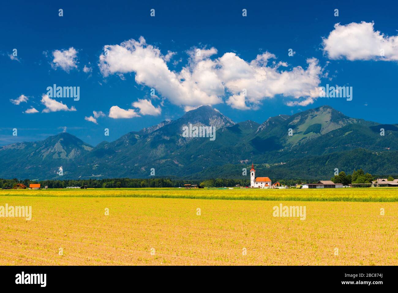 Beautiful landscape panorama. Blue sky with clouds. Lonely Church in ...