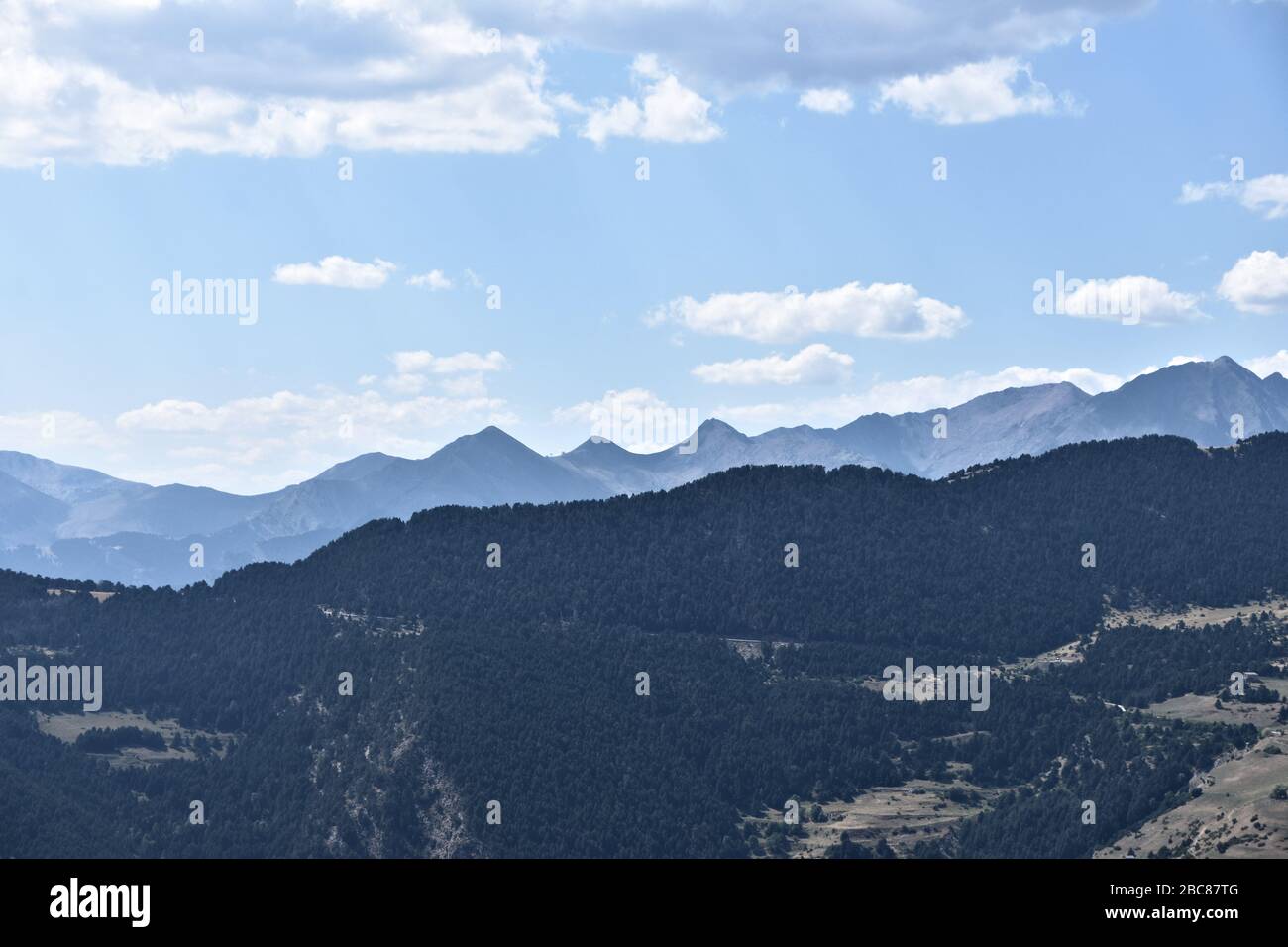 Misty blue peaks in Pyrenees Stock Photo - Alamy