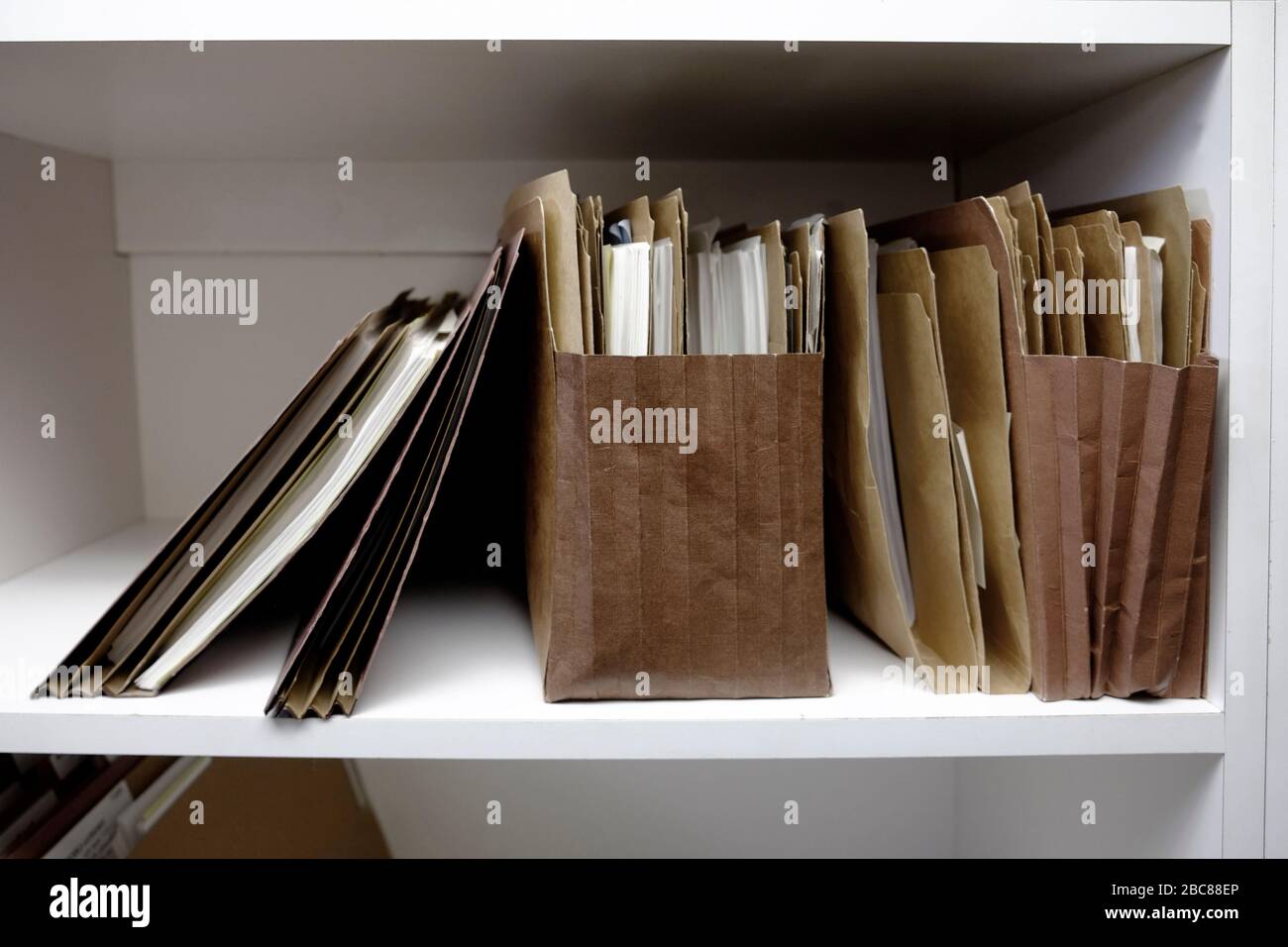 Business files in boxes folders and shelf papers Stock Photo - Alamy