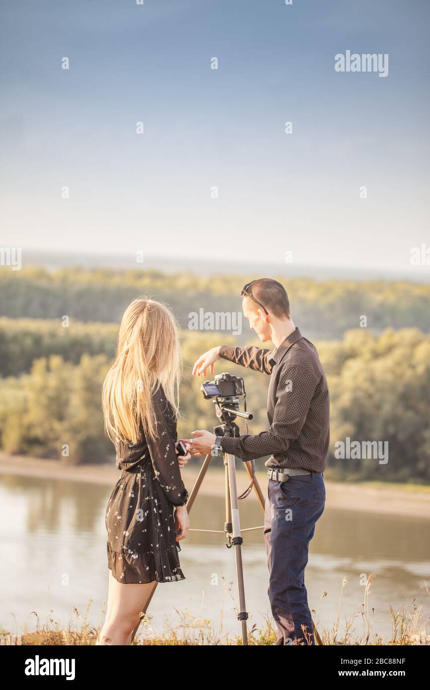 Woman girl filming movie camera hi-res stock photography and images - Alamy