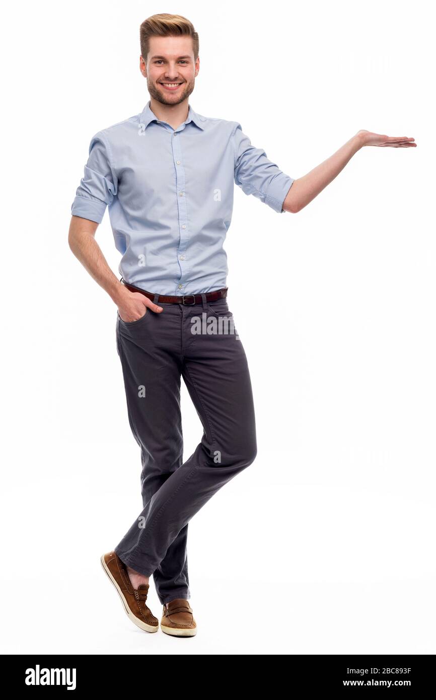 Portrait of young man standing on white background Stock Photo - Alamy