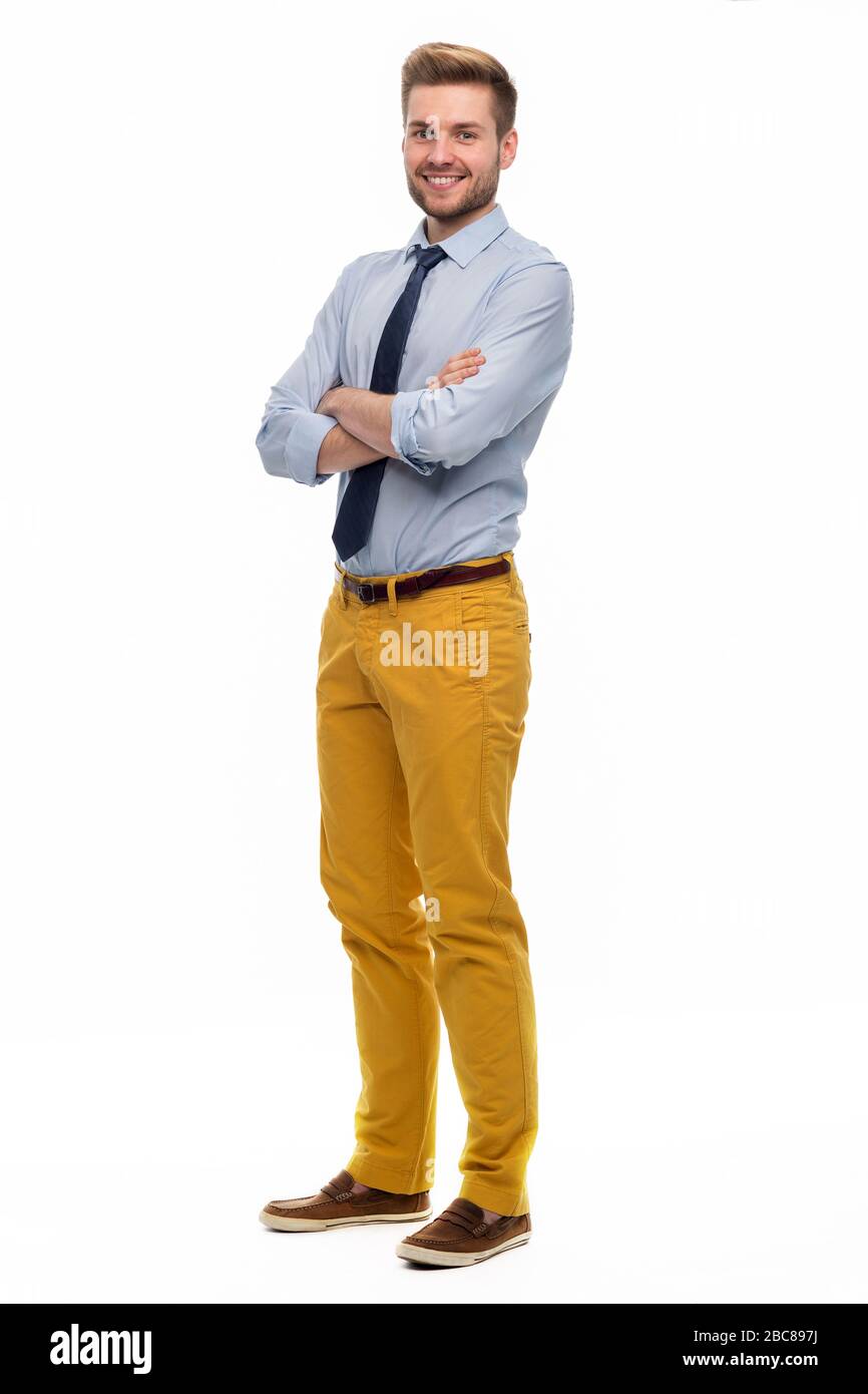 Portrait of young man standing on white background Stock Photo - Alamy