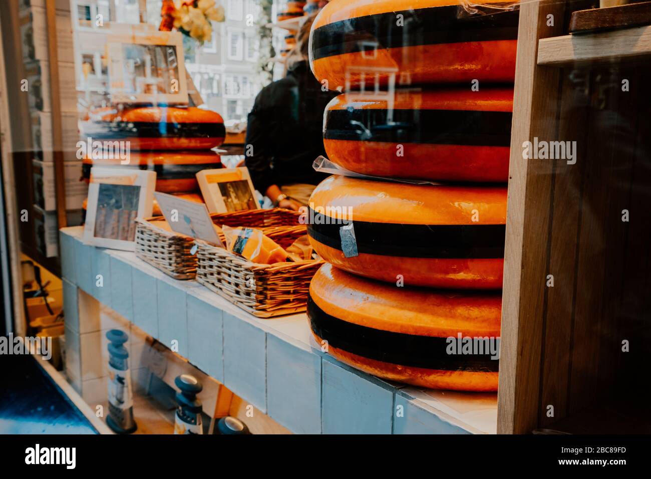 Dutch cheeses fill on a specialist cheese shop. Amsterdam, Netherlands ...