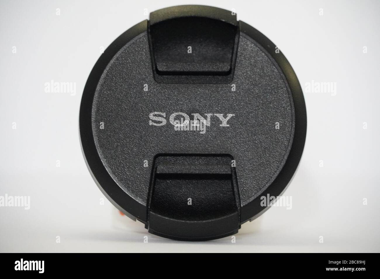Sony Camera Lens Cap on white background. Branded cap of camera lens ...