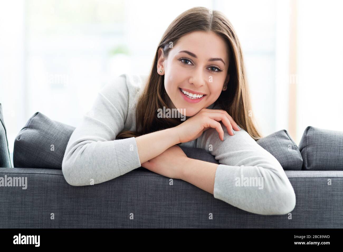 Woman relaxing on cozy hi-res stock photography and images - Alamy
