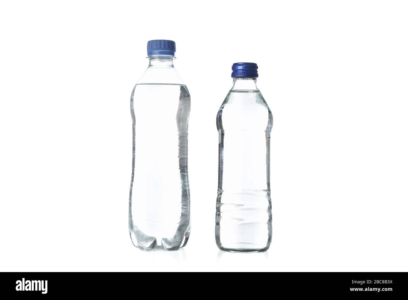 Bottles with water isolated on white background Stock Photo - Alamy