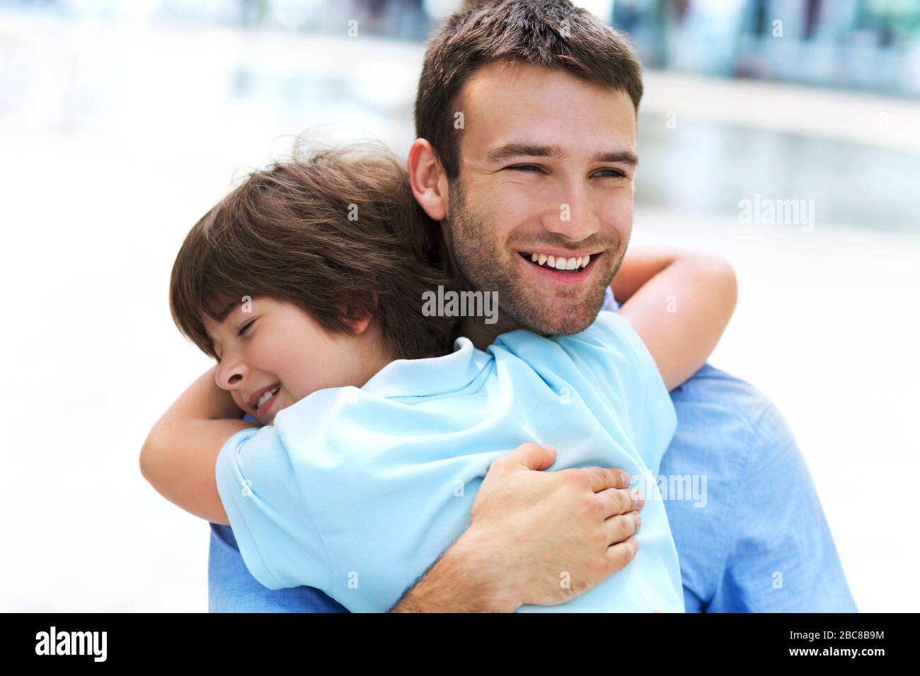 Father and child playing outdoors Stock Photo - Alamy